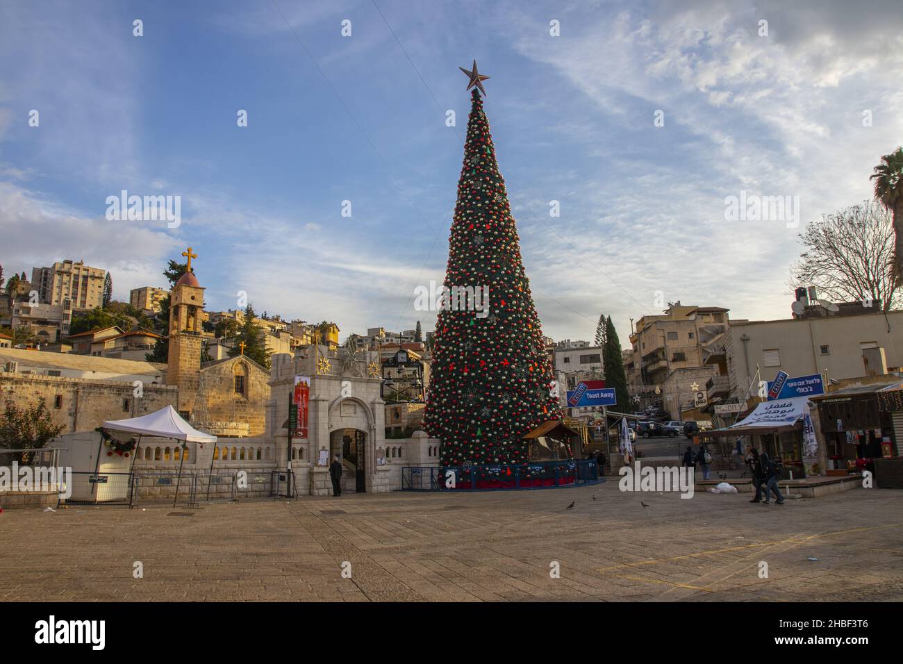 light decorations and christmas trees during new year celebration in ...