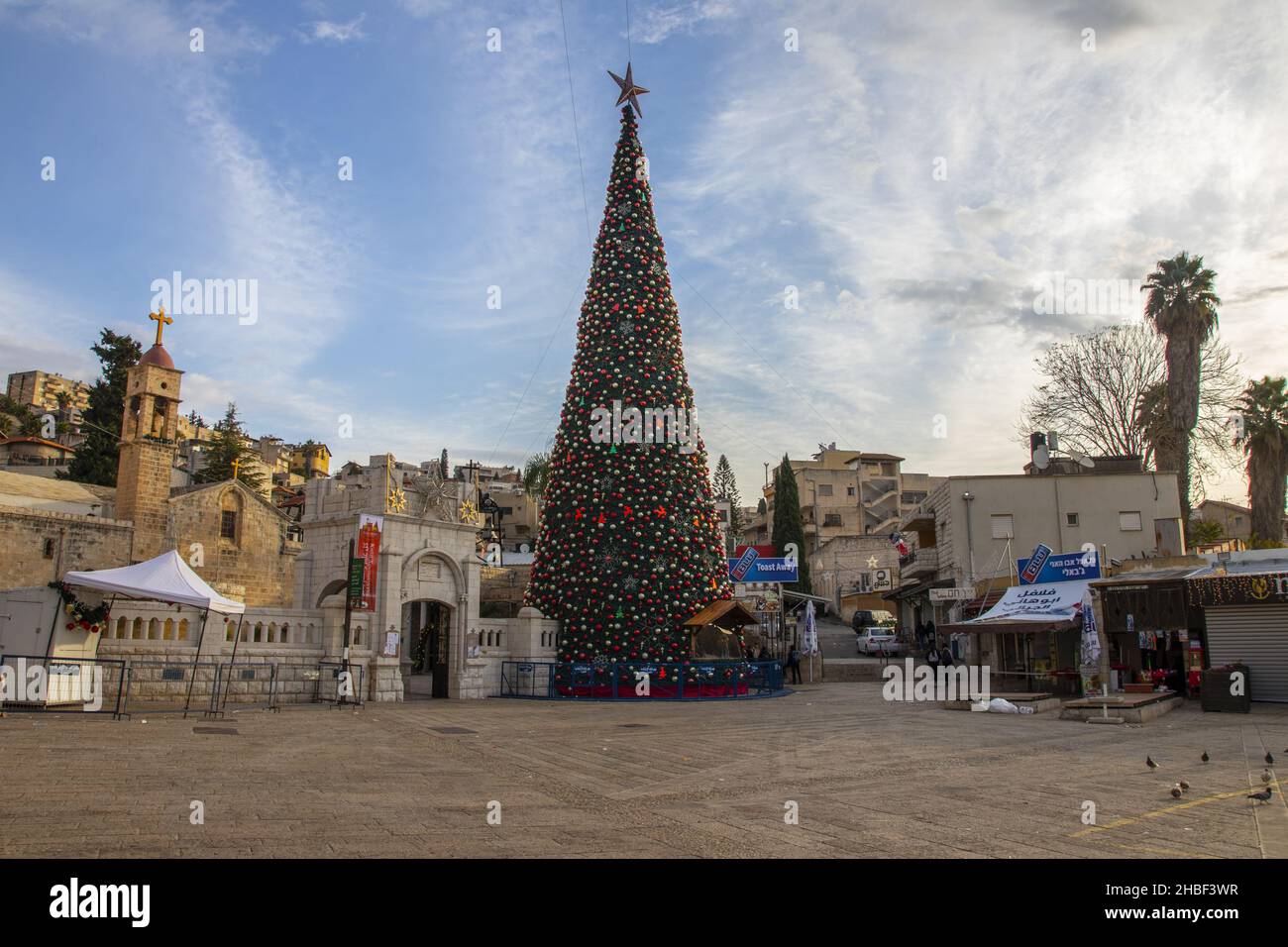 light decorations and christmas trees during new year celebration in ...