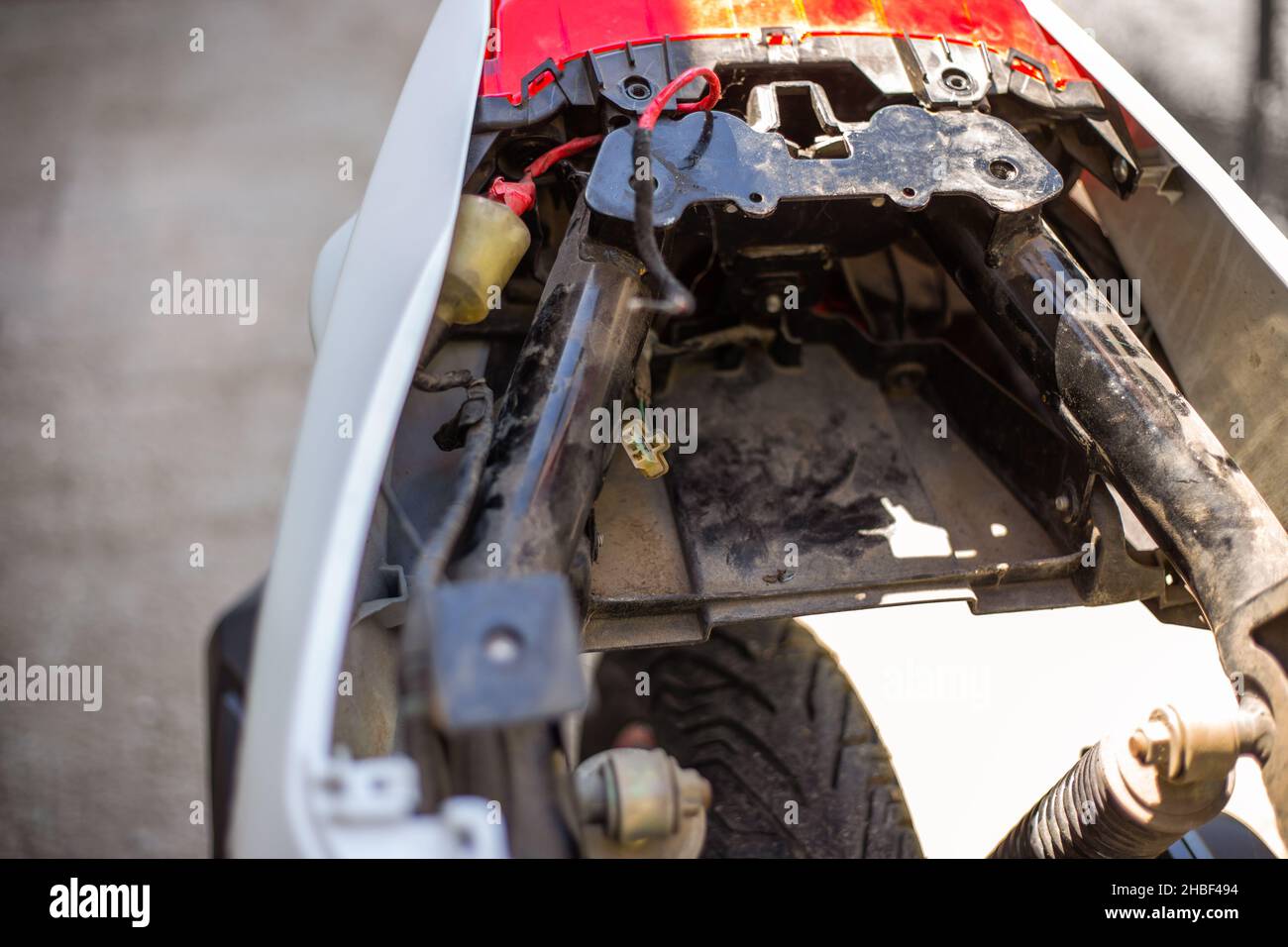 The rear of the disassembled motorbike. Repair and maintenance of ...