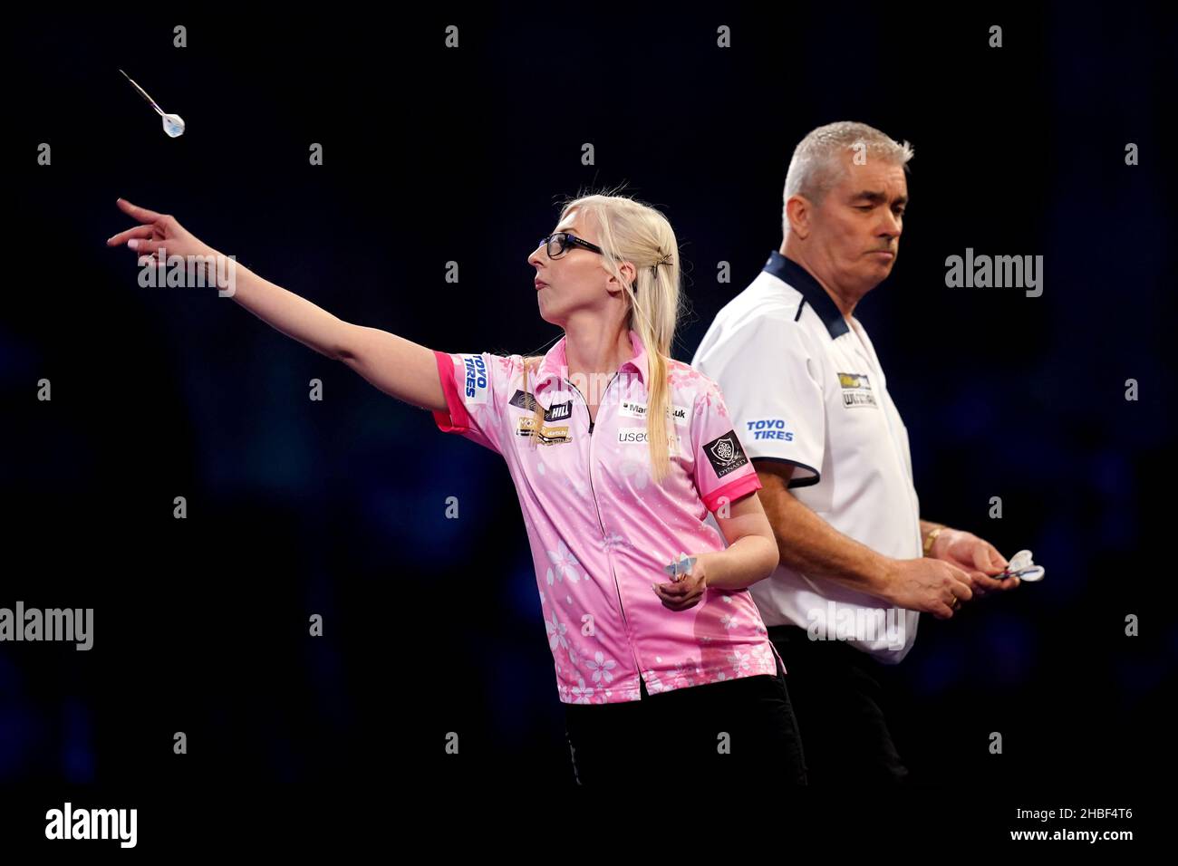 Fallon Sherrock throwing during her match against Steve Beaton, (right ...