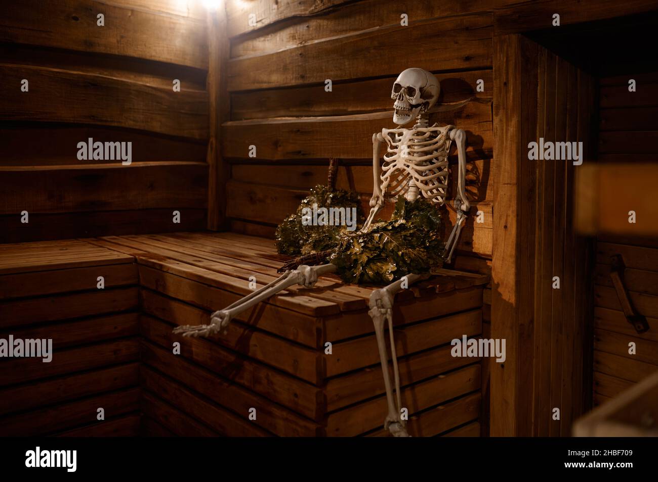 Skeleton steaming with oak broom in sauna Stock Photo - Alamy