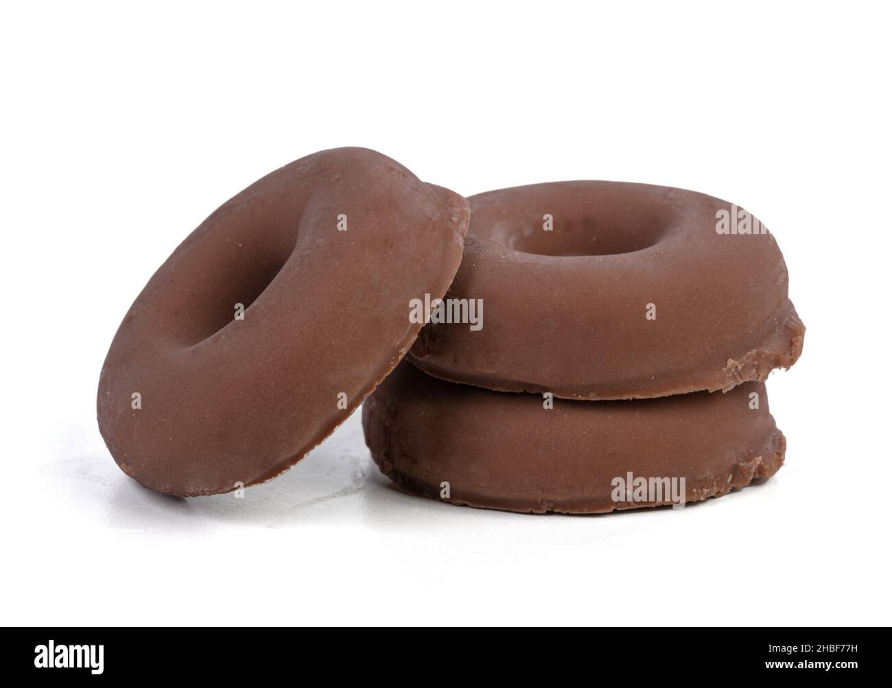 Small chocolate circle cookies on white background Stock Photo - Alamy