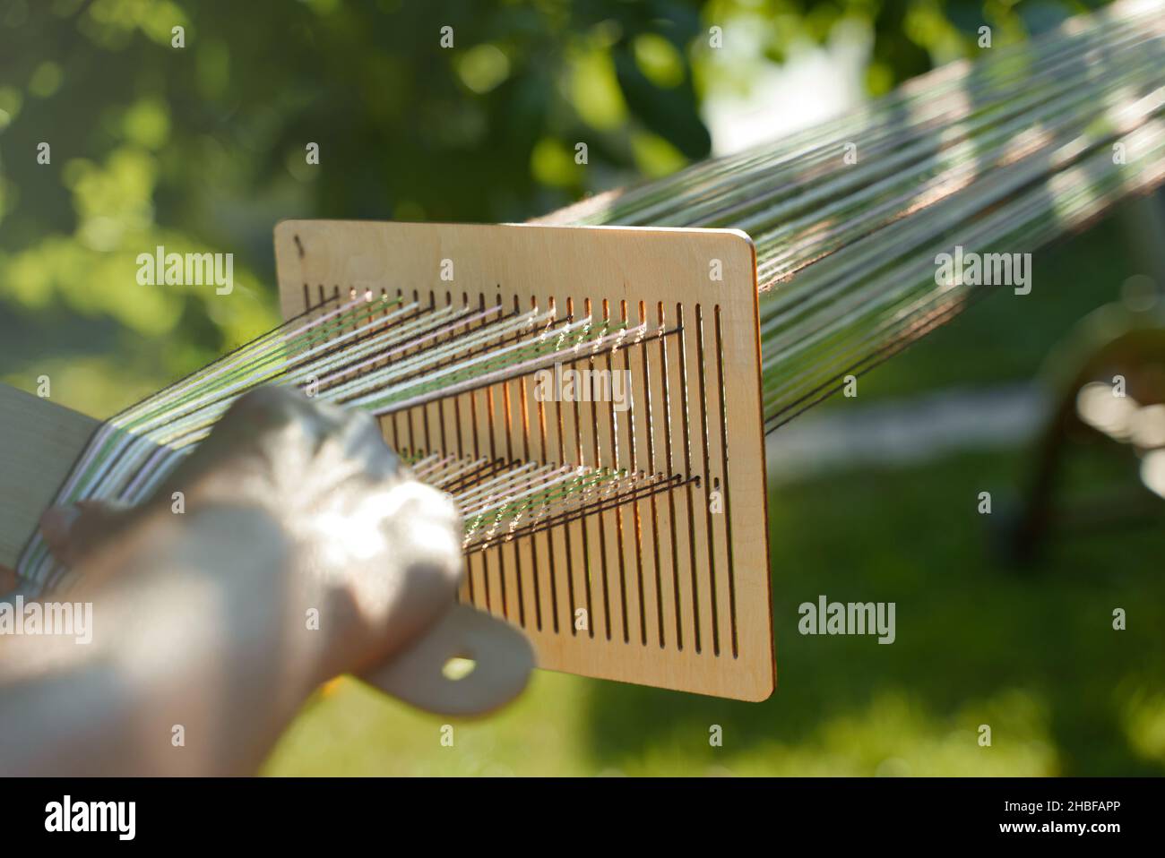 Traditional hand weaving on a reed Stock Photo - Alamy