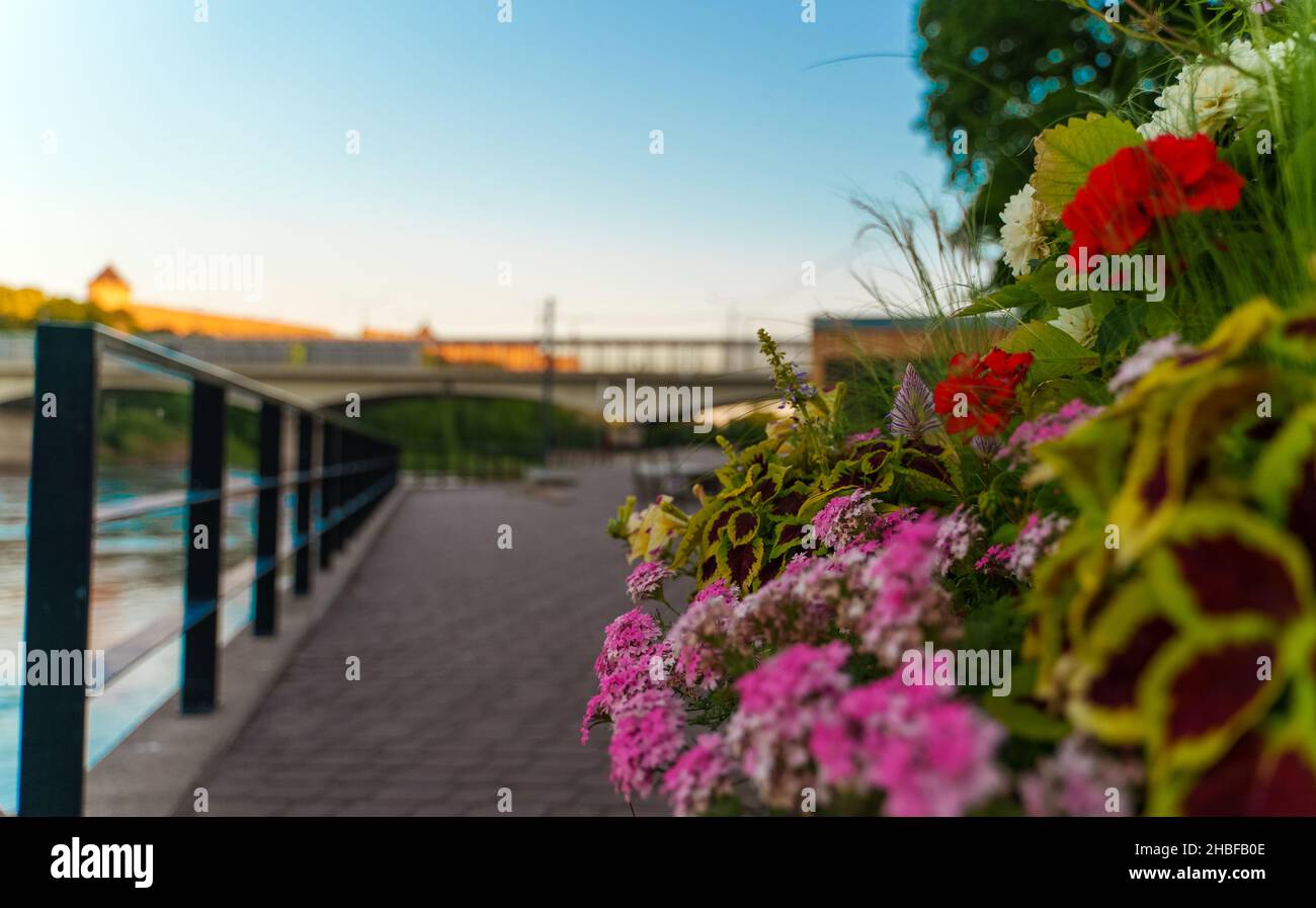 Promenade by the river Narva in Estonia Stock Photo - Alamy