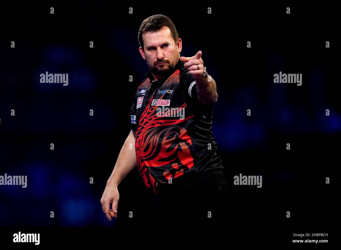 Jonny Clayton celebrates defeating Keane Barry during day five of the ...