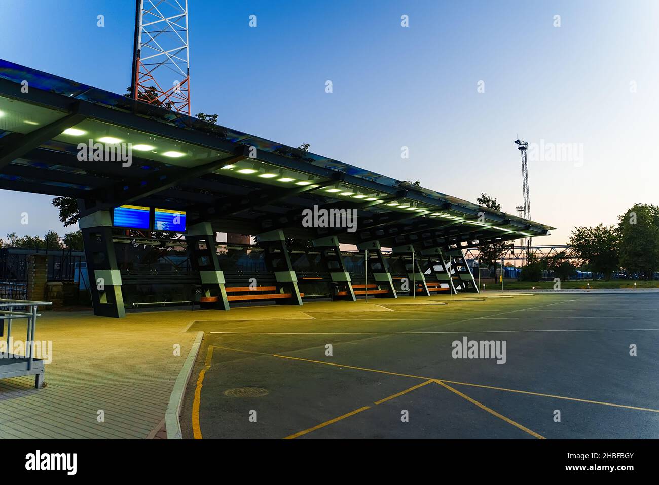 Modern intercity bus station at evening Stock Photo - Alamy