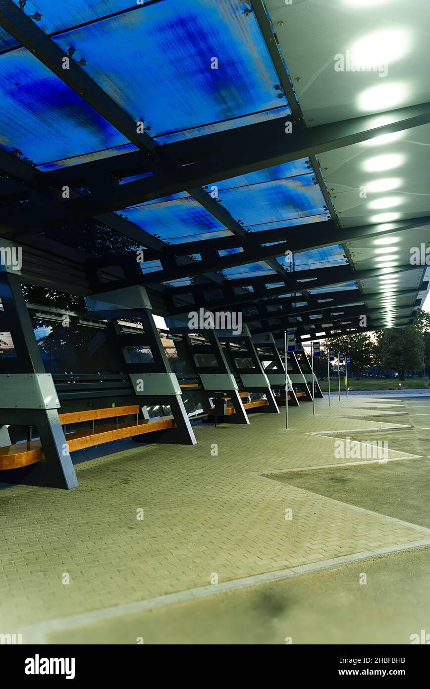 Modern intercity bus station at evening Stock Photo - Alamy