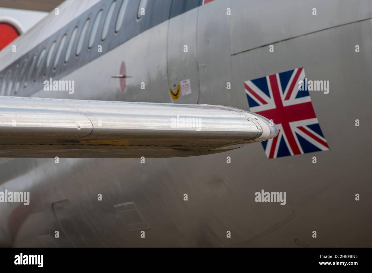 Wingtip of airliner in front of airliner with Union Jack on it Stock ...