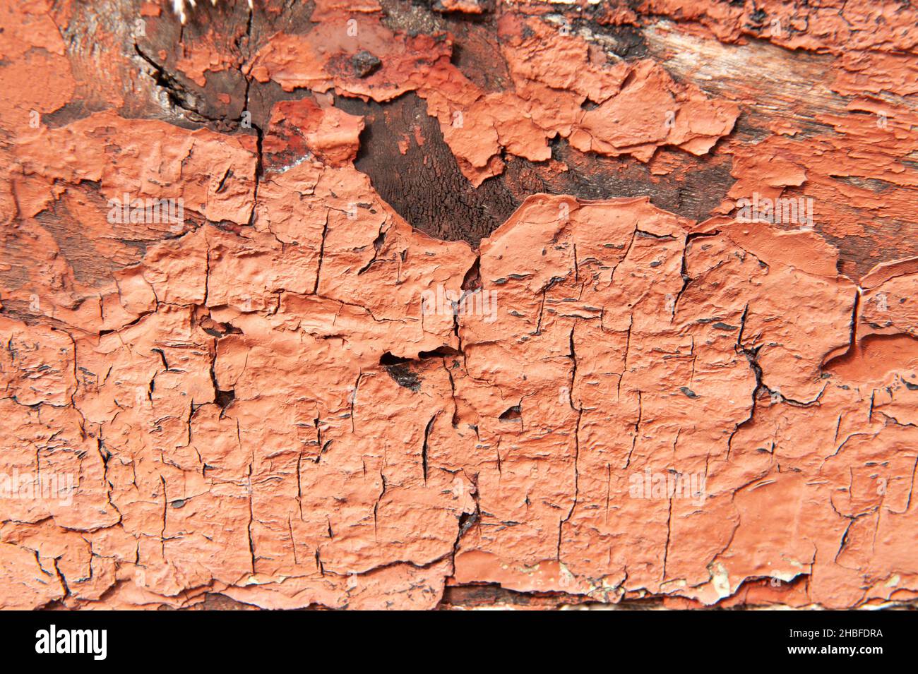 Orange cracked paint Stock Photo - Alamy