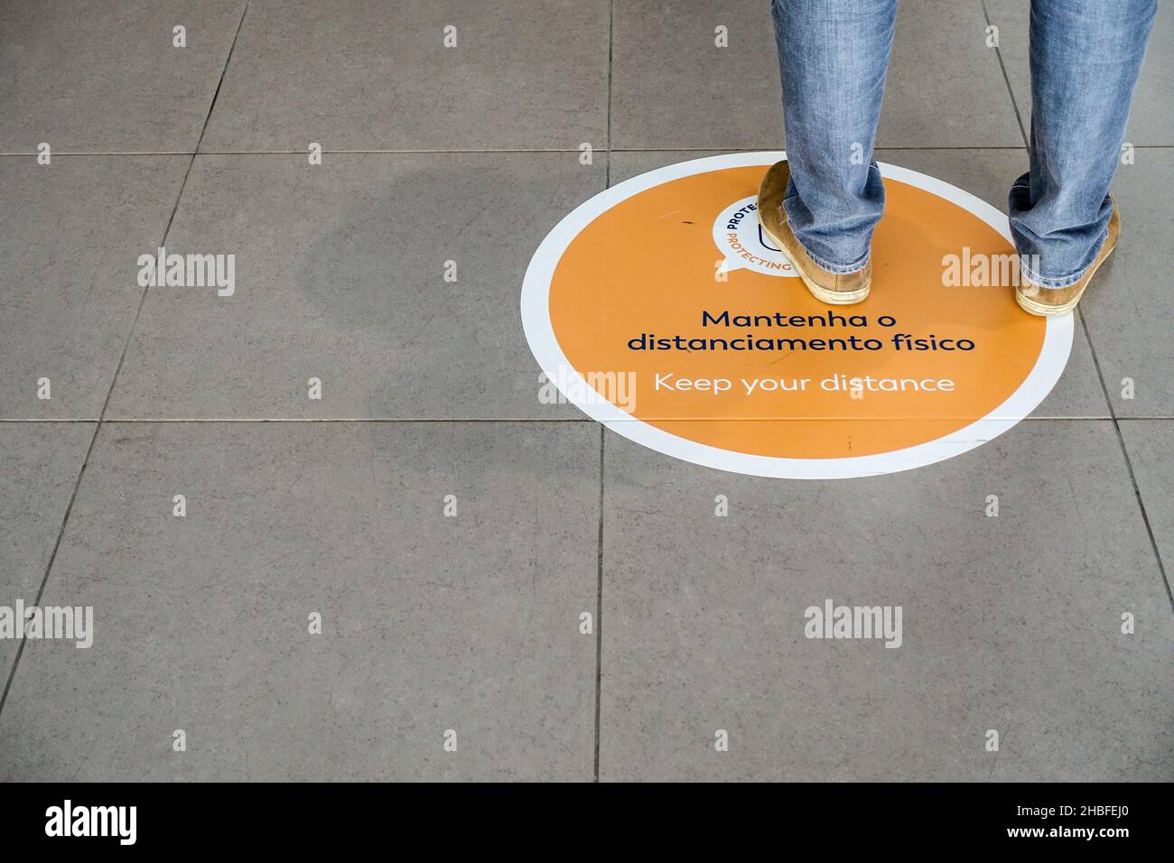 "Keep your distance" signs at Faro Airport, Portugal, as travellers ...