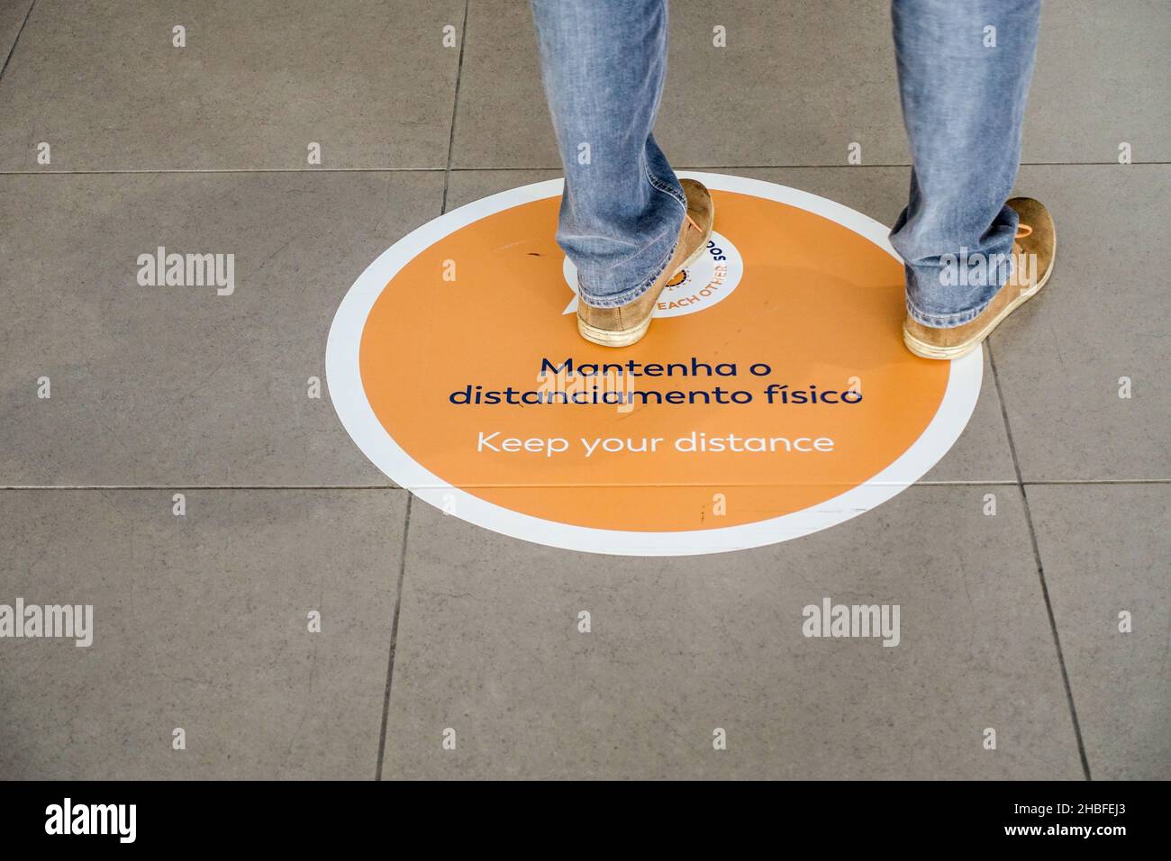 "Keep your distance" signs at Faro Airport, Portugal, as travellers ...