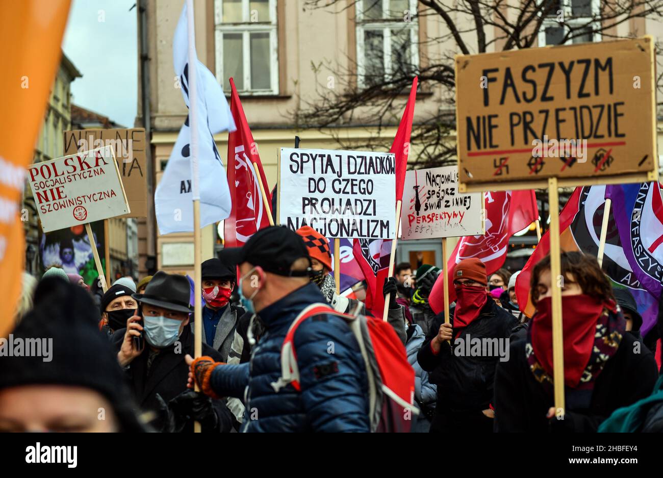 Protesters hold placards during the demonstration. Protest in defense ...