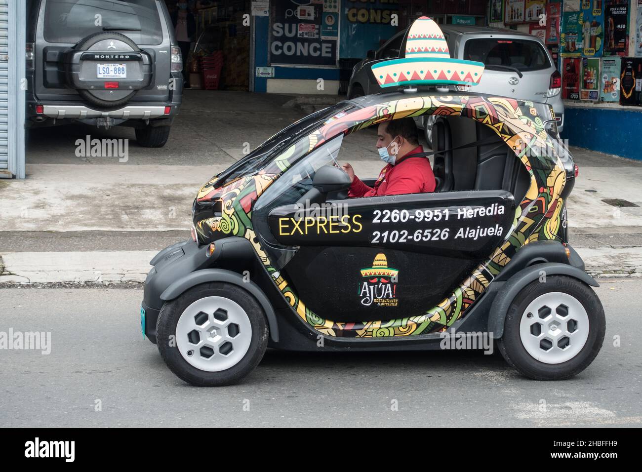 Small, colorful Mexican restaurant delivery vehicle in Costa Rica Stock ...