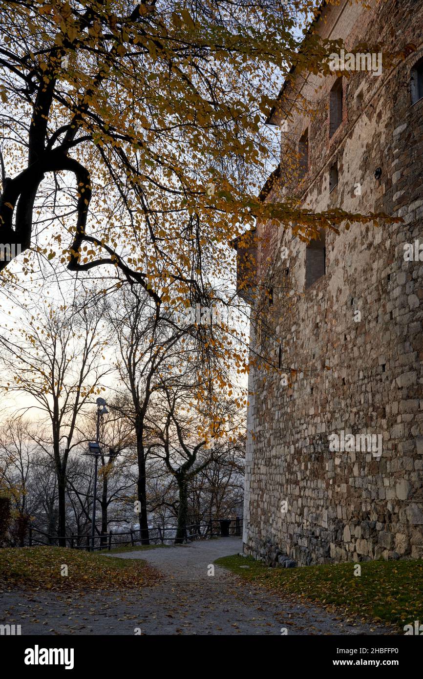 A scenic shot of an old building surrounded by an autumn park Stock ...