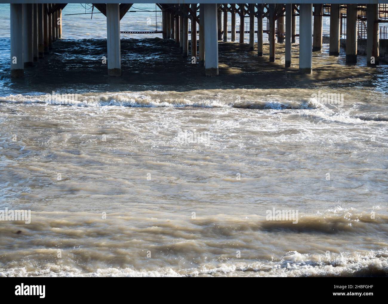 Sea pier with columns on the beach in Sochi Stock Photo - Alamy
