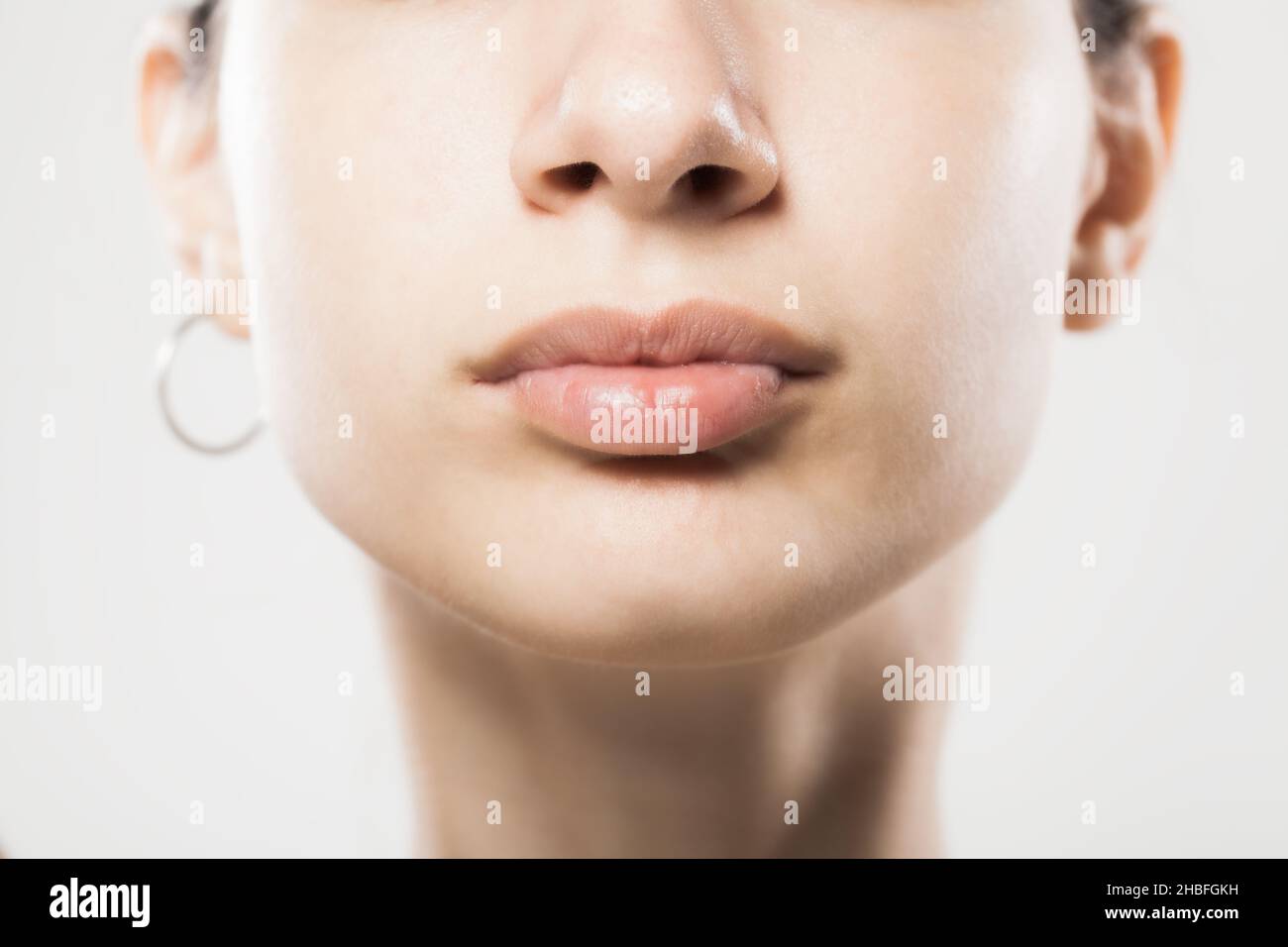 Beautiful young girl studio portrait. Abstract lips and nose Stock ...