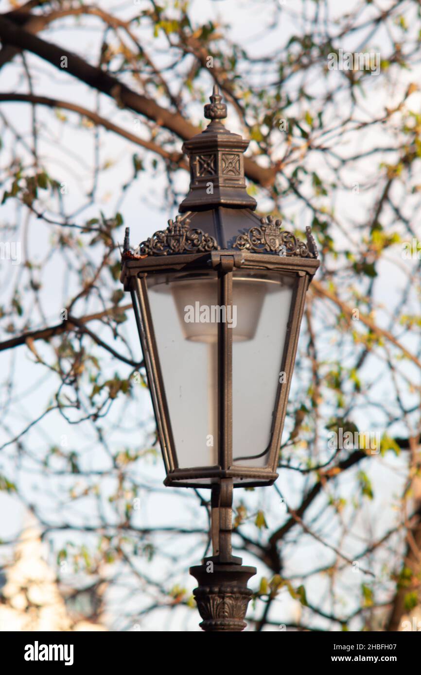 An art nouveau metal lamp post in the light of the winter sun Stock ...