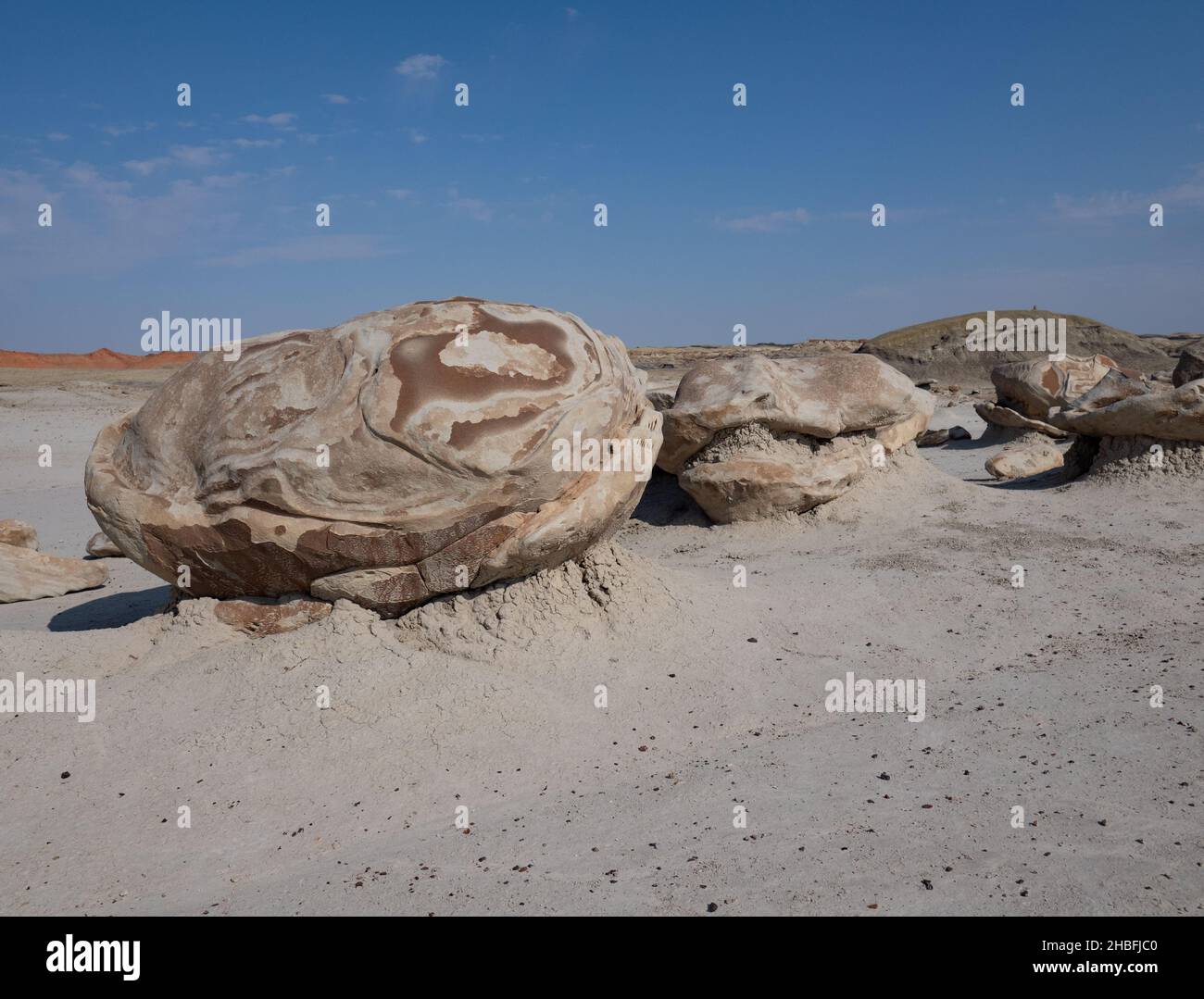 Cracked egg rock formations with mudstone and minerals with sand in the ...
