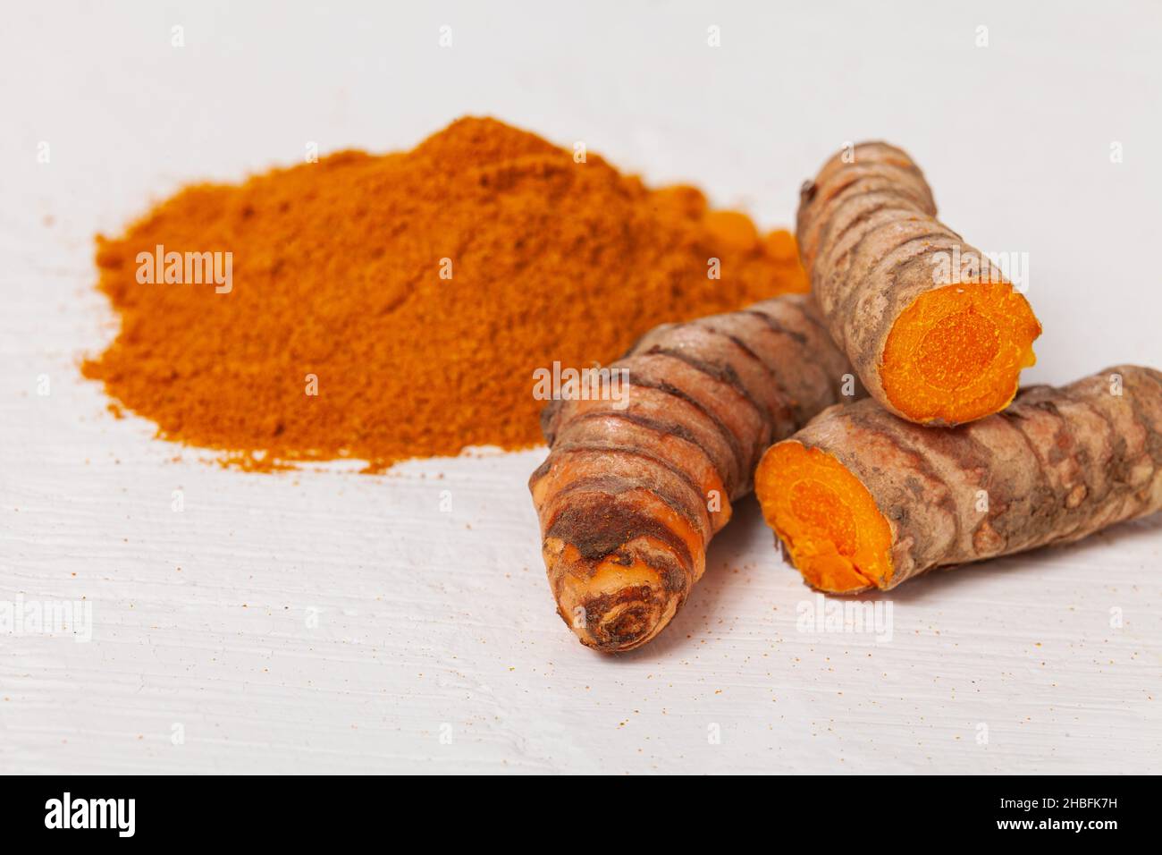 Fresh organic root and turmeric powder - Curcuma longa Stock Photo - Alamy