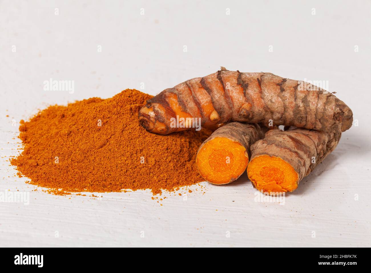 Fresh organic root and turmeric powder - Curcuma longa Stock Photo - Alamy
