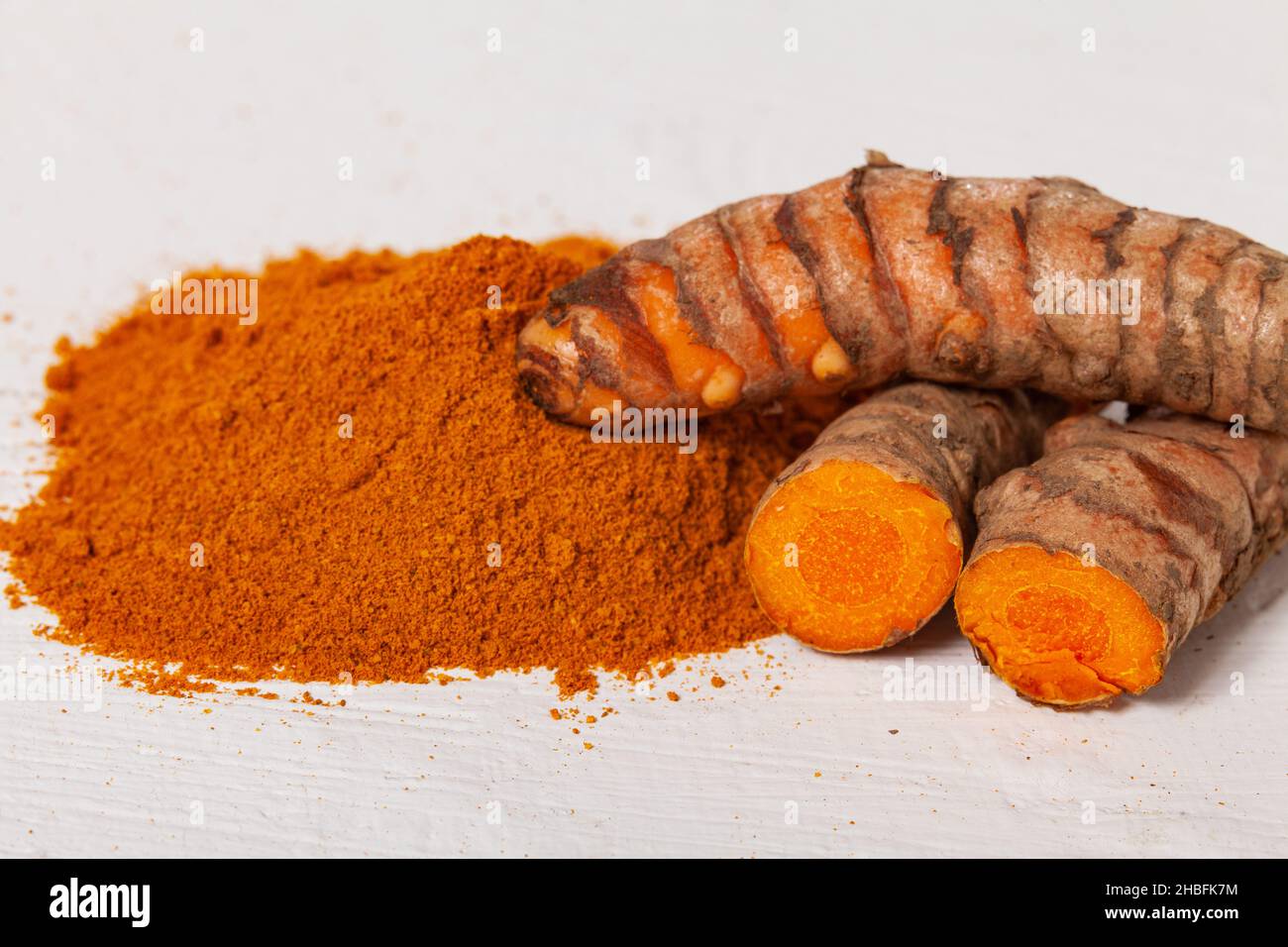 Fresh organic root and turmeric powder - Curcuma longa Stock Photo - Alamy