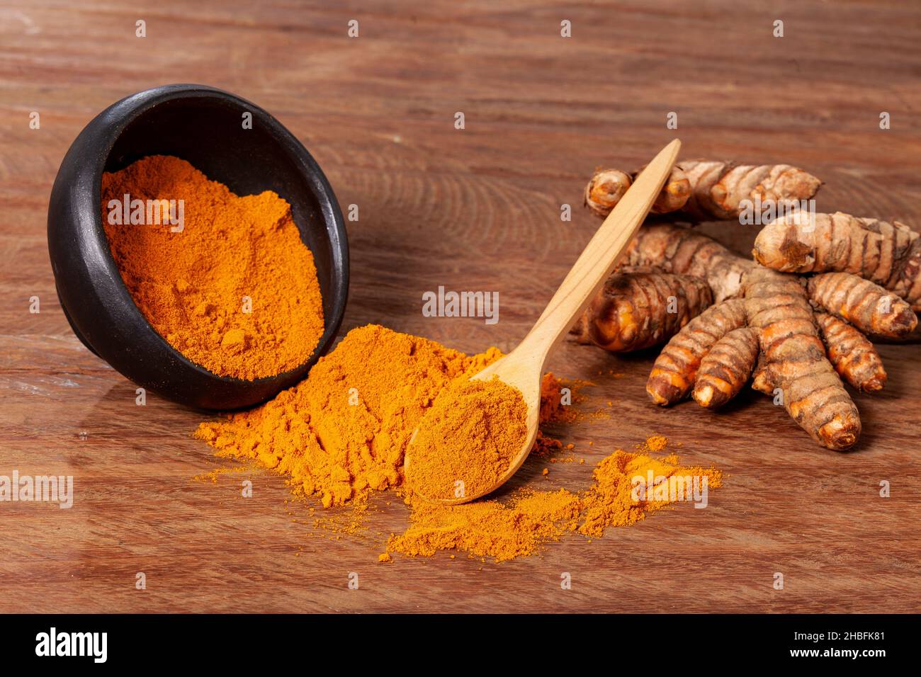 Fresh organic root and turmeric powder - Curcuma longa Stock Photo - Alamy