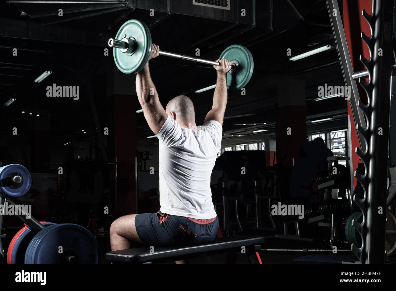 Young athlete lifts heavy barbell hi-res stock photography and images ...