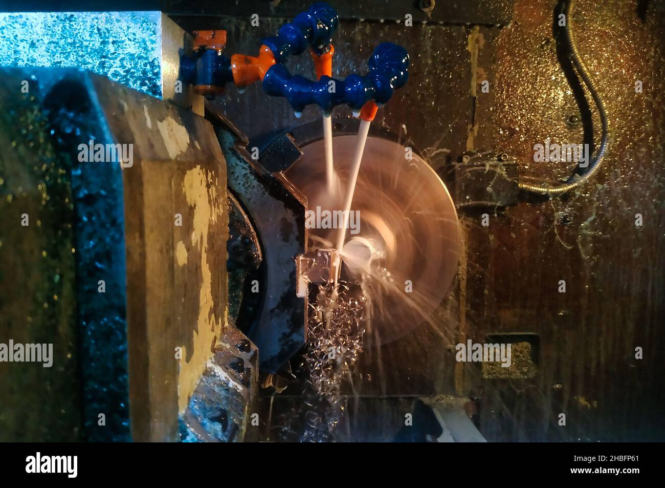 Metal cutting blanks on a multi-purpose CNC machine with different ...