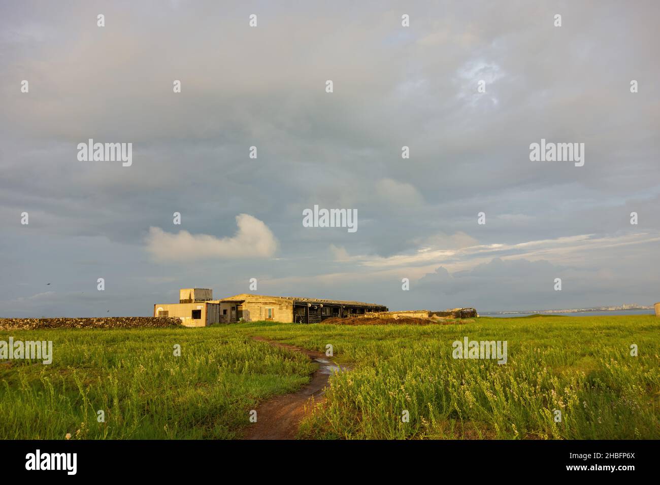 Sunset with a farm building at Penghu island, Taiwan Stock Photo - Alamy