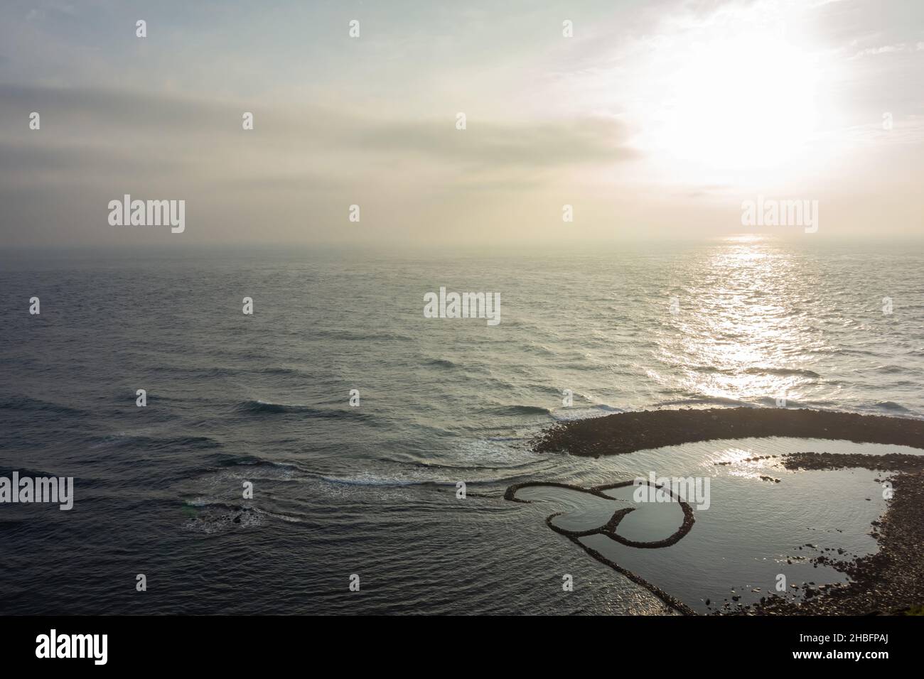 Twin Hearts Stone Weir in Penghu island at Taiwan Stock Photo - Alamy