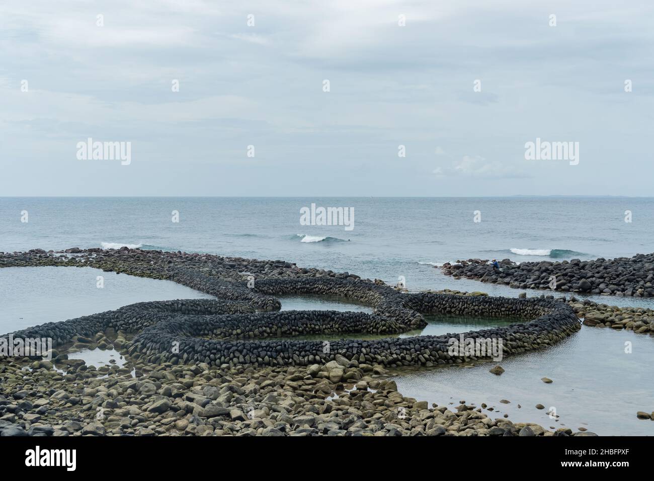 Twin Hearts Stone Weir in Penghu island at Taiwan Stock Photo - Alamy