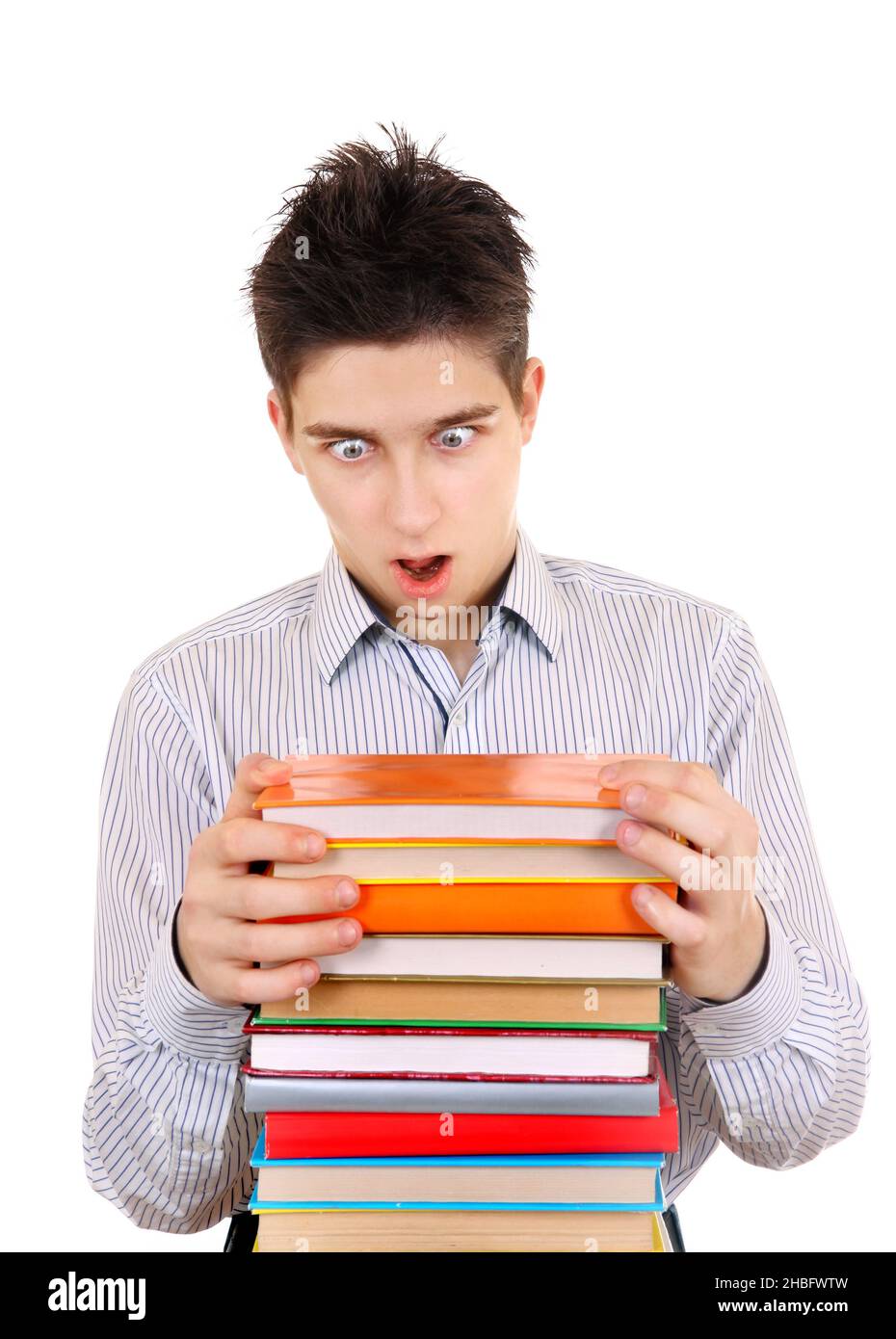 Surprised Teenager looking on the Books Isolated on the White ...