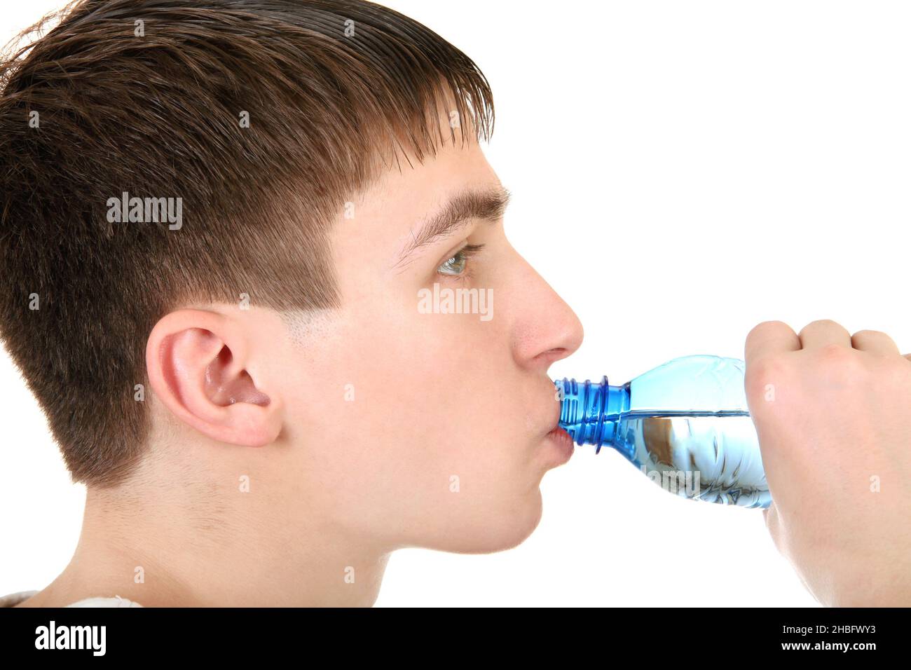 Teenager drinking the Pure Water on the White Background Stock Photo ...