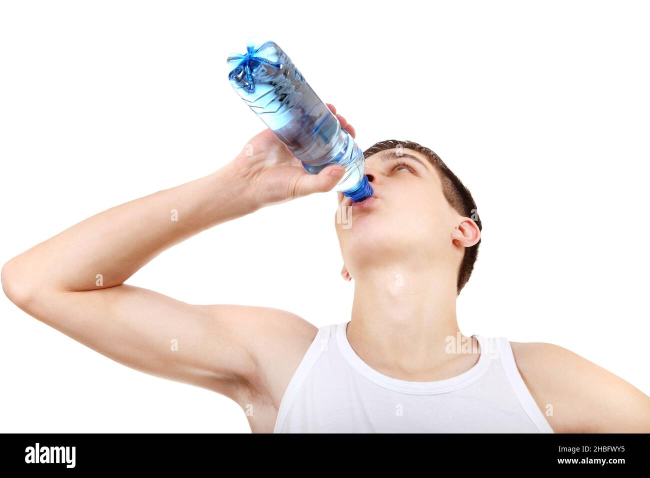 Teenager drinking the Pure Water on the White Background Stock Photo ...