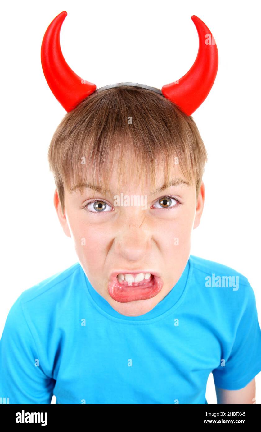 Angry and Naughty Kid with Devil Horns on the Head Isolated on the ...