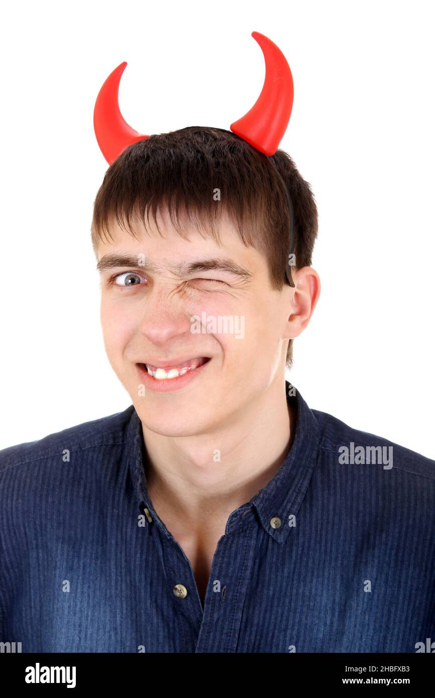 Sly Teenager with Devil Horns on the Head Isolated on the White ...