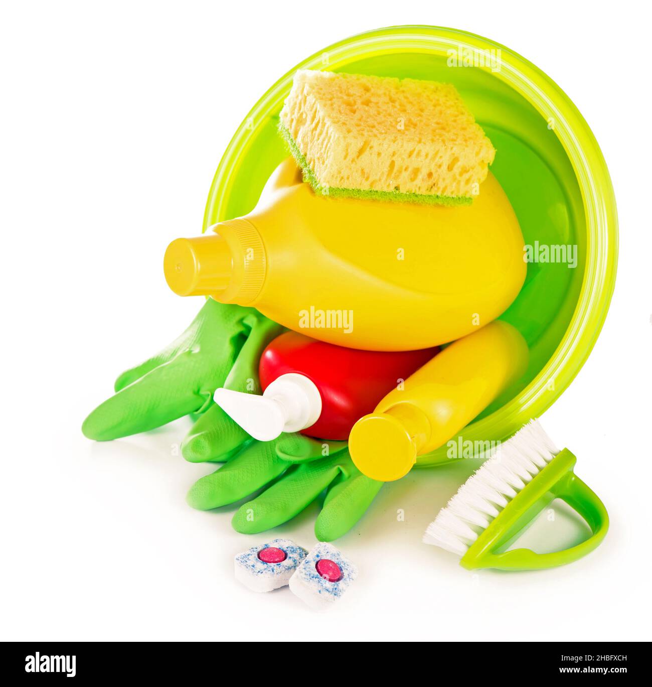 Household cleaning products and accessories in basket with detergent ...