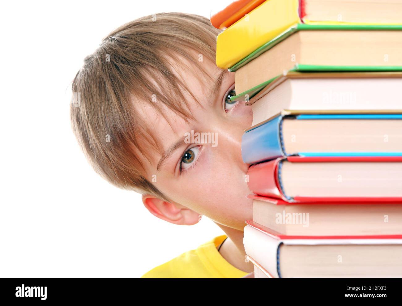 Sad Kid behind the Books Isolated on the White Background Stock Photo ...