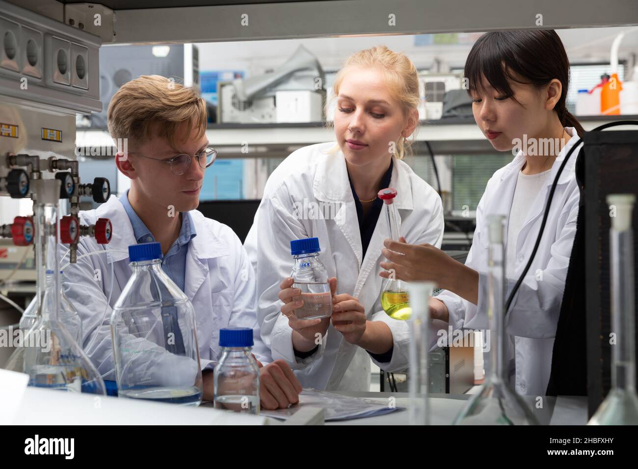 Students working in university laboratory Stock Photo - Alamy