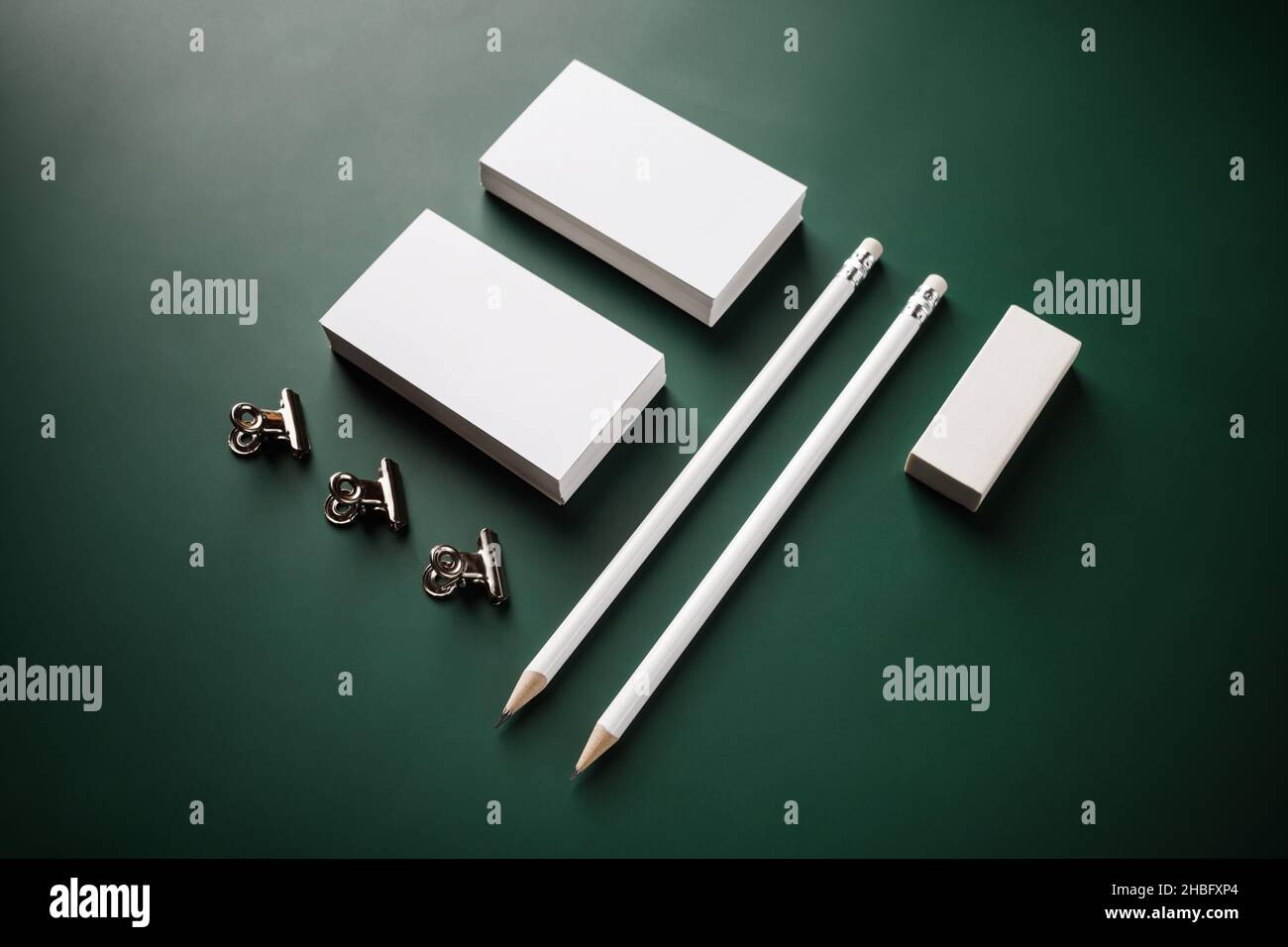 Branding stationery mockup on green background. Blank objects for ...