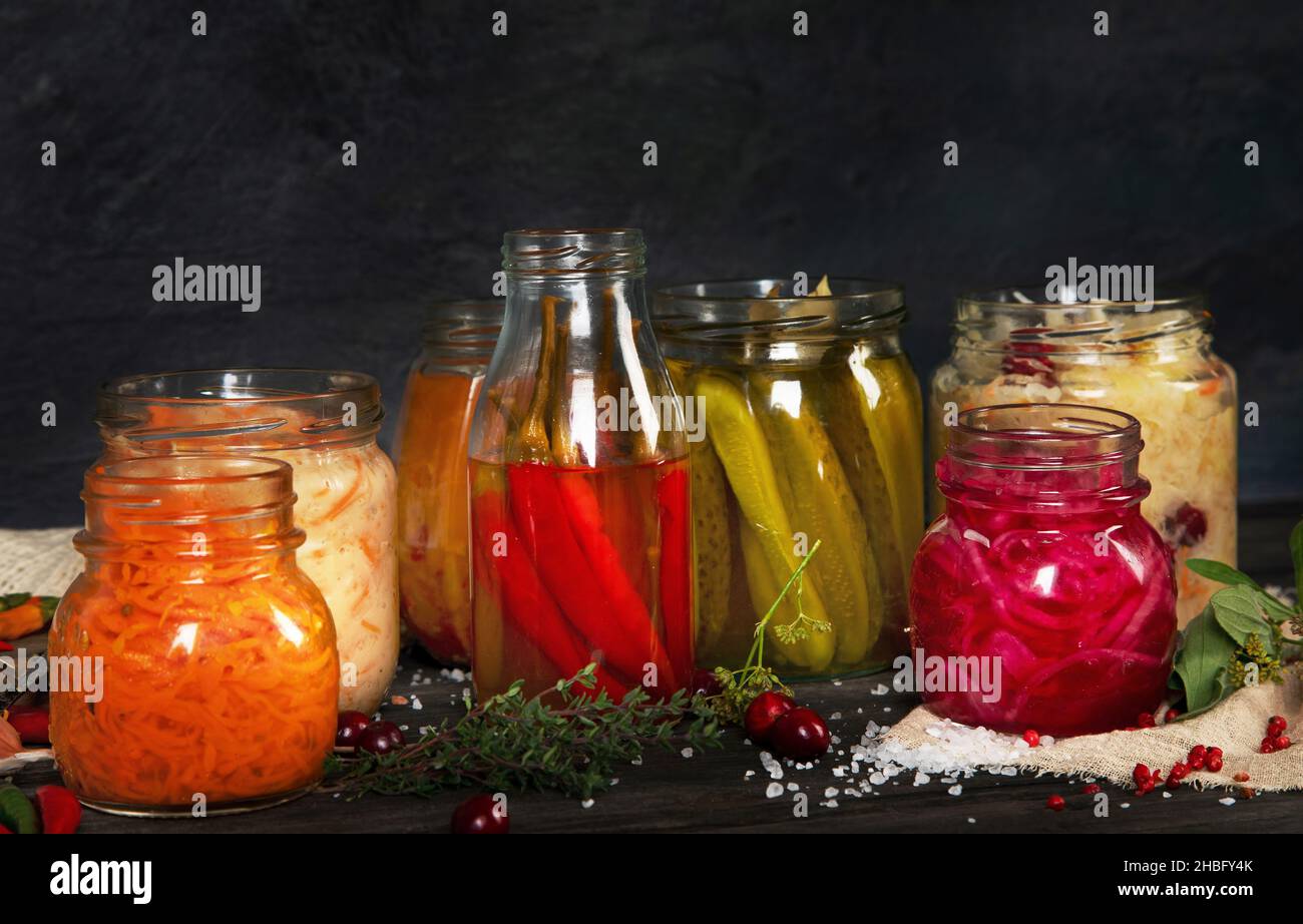 Fermented food on wooden table. High source of probiotics. Front view ...