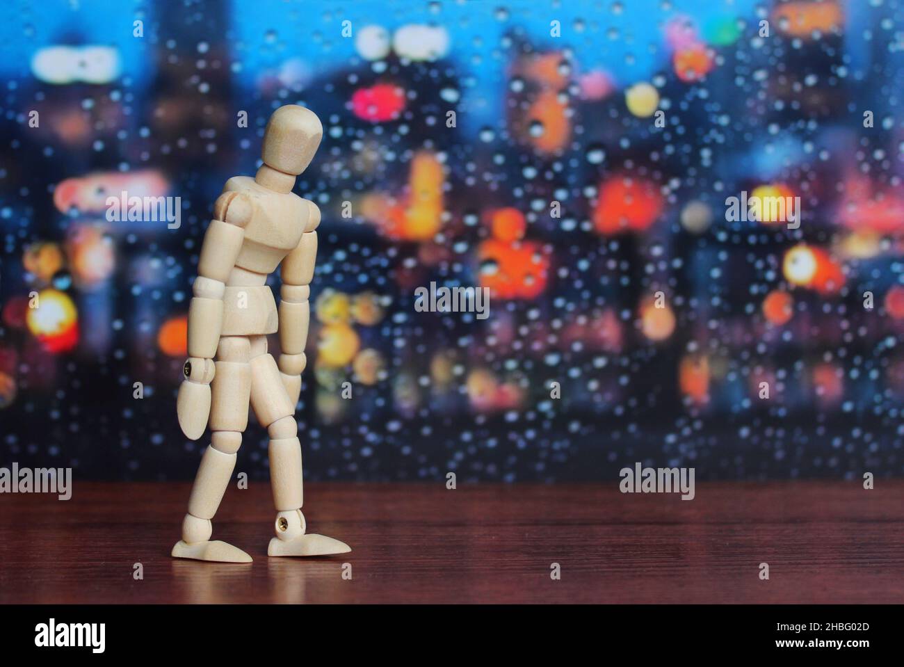 Wooden human figure sad and disappointment on wooden table against ...