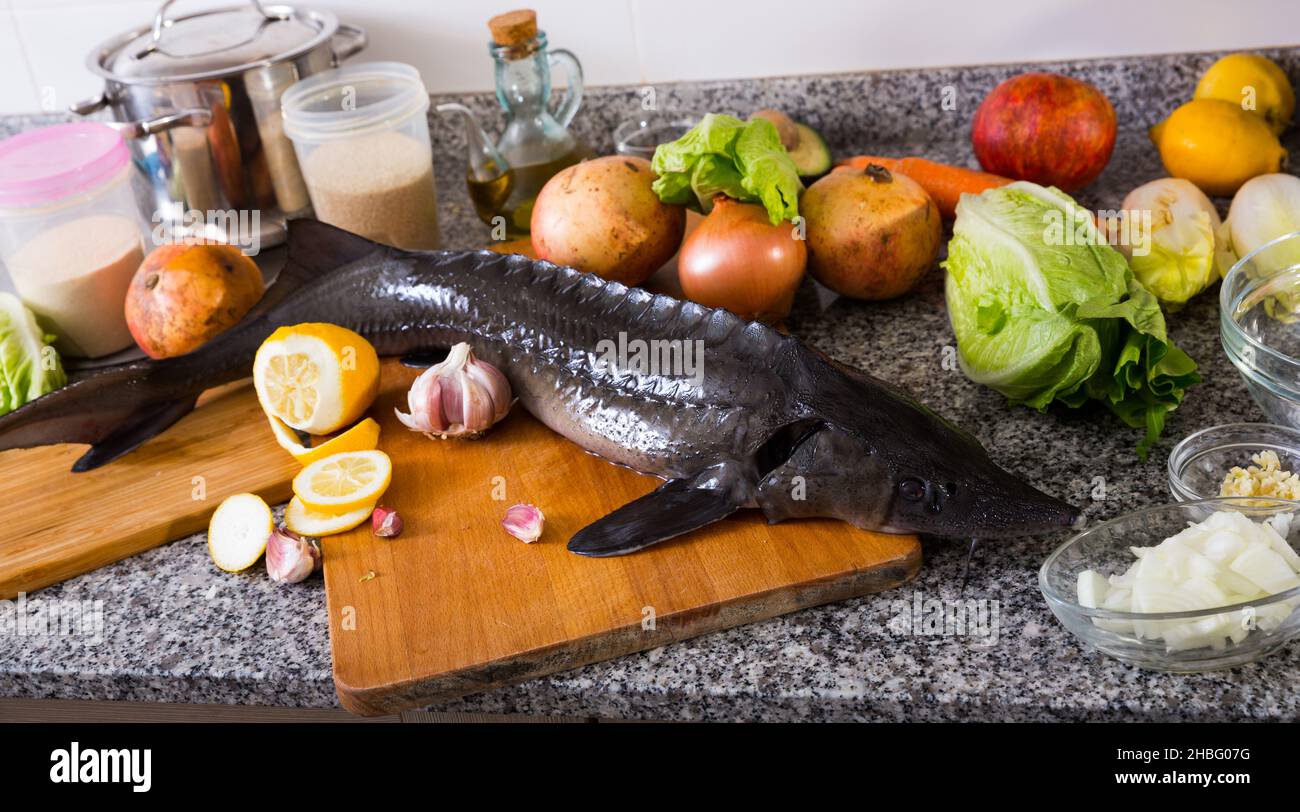 Sturgeon fish with fresh fruits and vegetables Stock Photo - Alamy