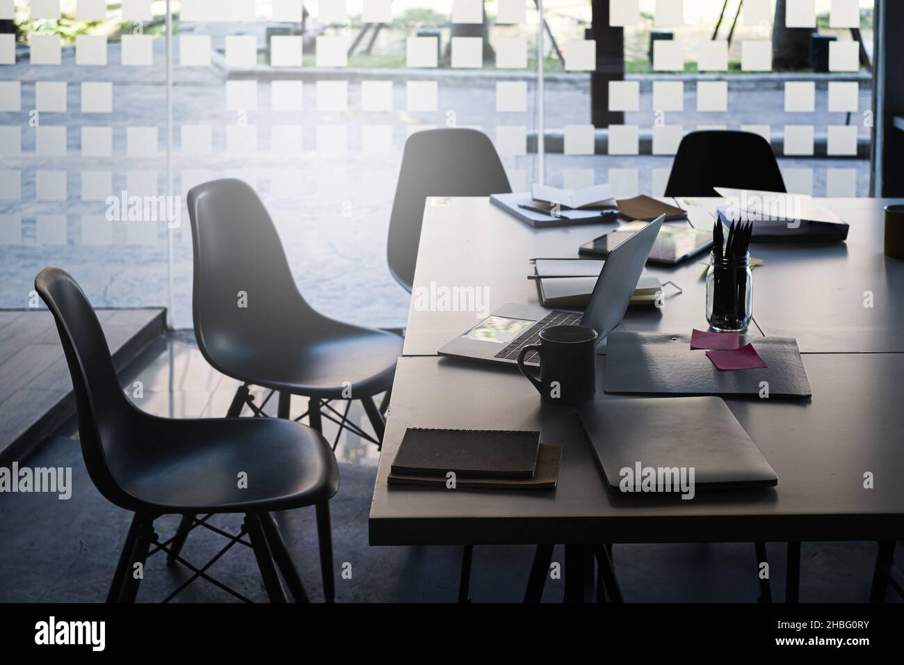 Meeting room with laptop notebook and document paperwork on desk Stock ...