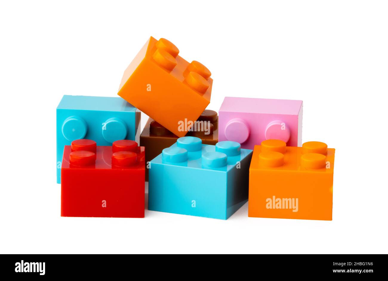 Colorful plastic toy building blocks isolated on white Stock Photo - Alamy