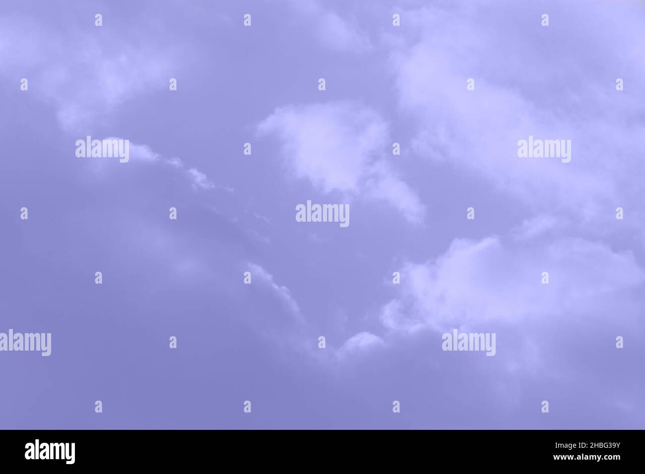 Clouds tinted in the color of the year 2022 Very Peri. Beautiful sky ...