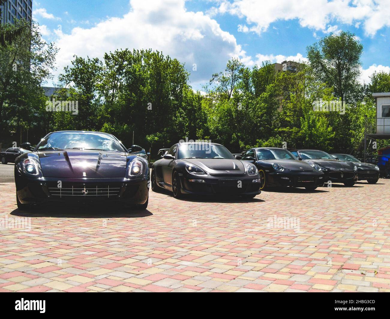 Kiev, Ukraine - May 14, 2011: Black supercars Ferrari 599 GTB Fiorano ...