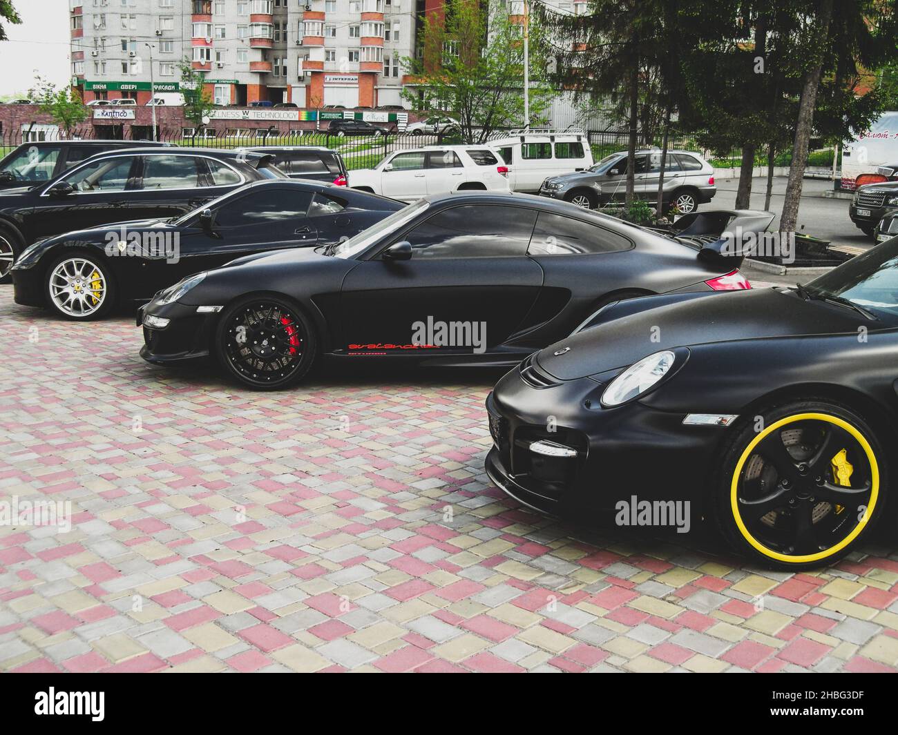 Kiev, Ukraine - May 14, 2011: Black supercars Ferrari 599 GTB Fiorano ...