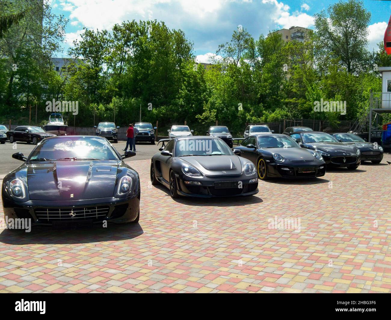 Kiev, Ukraine - May 14, 2011: Black supercars Ferrari 599 GTB Fiorano ...