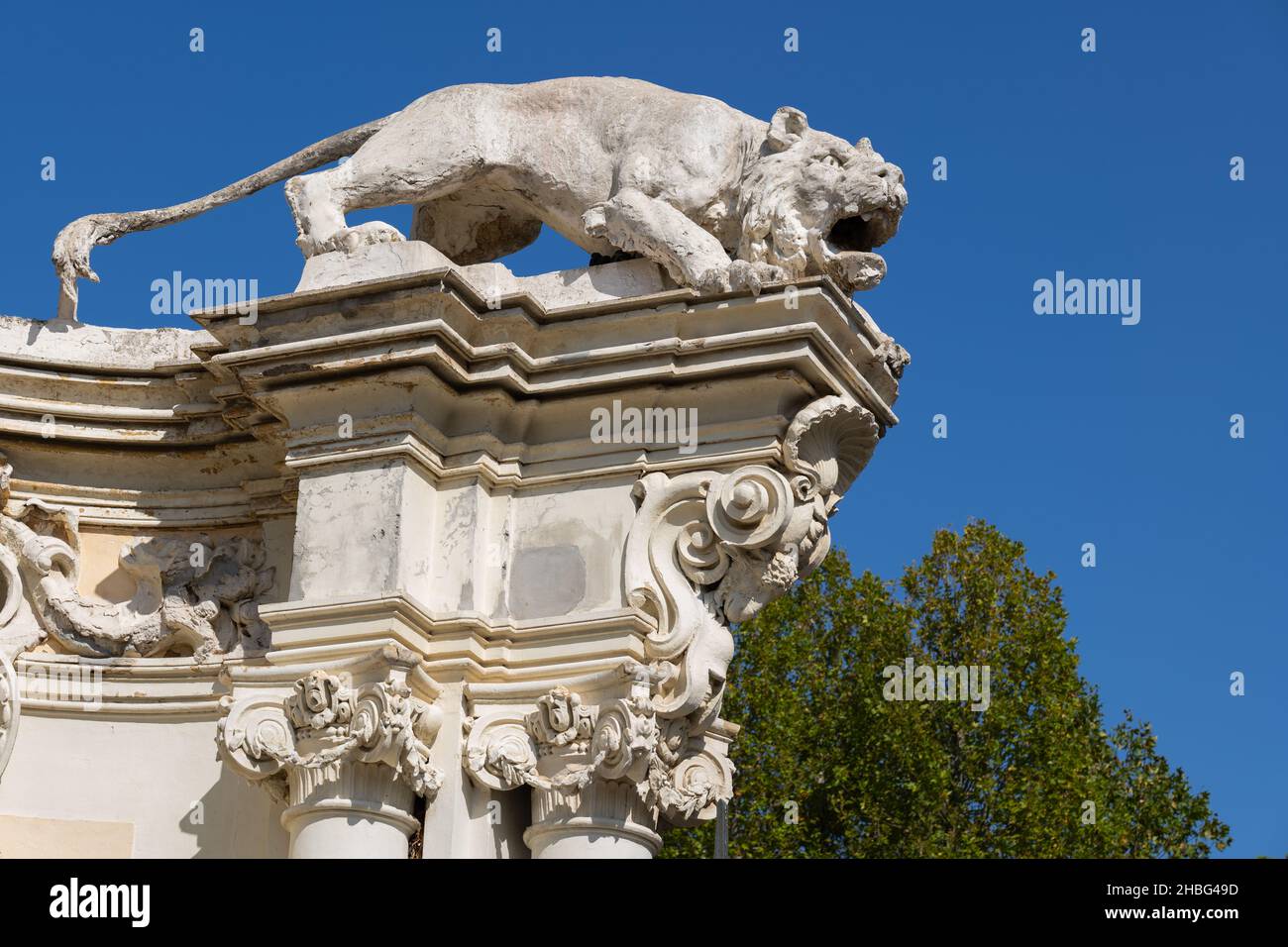 Rome, Italy, lion sculpture, historical entrance gate to the Bioparco di Roma zoological garden ...